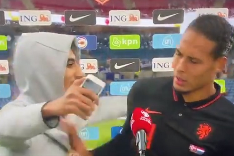 Netherlands captain Virgil van Dijk pushes a fan who wanted a photo ...